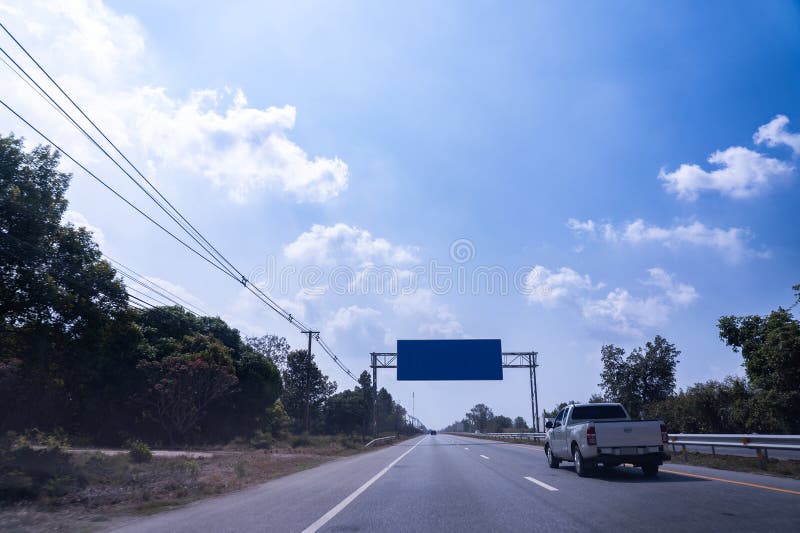 Blue Empty Road Sign on the Highway Bright Sky Background Stock Photo ...