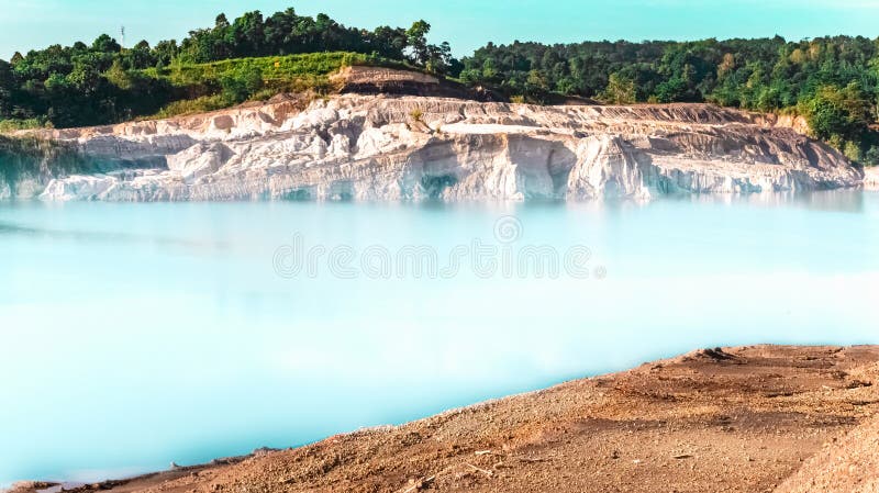 Blue Ex-mining Lake, Green Forest, Bright Sky. Stock Image - Image of ...