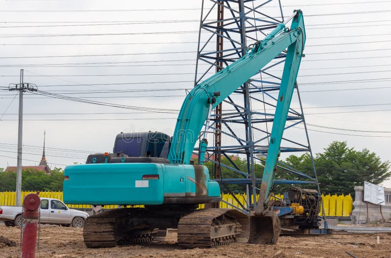 The blue excavator stock photo. Image of landscape, power - 214550458