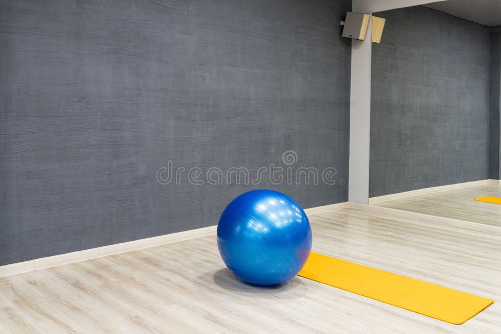 Blue Exercise Ball in the Sports Complex. Stock Photo - Image of ...