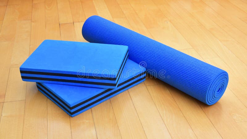 Blue Exercise Mat beside Pair of Blocks for Yoga or Pilates Stock Image ...