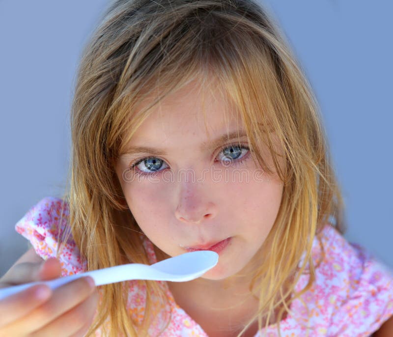 Blue Eyes Kid Girl Eating Breakfast with Spoon Stock Photo - Image of ...