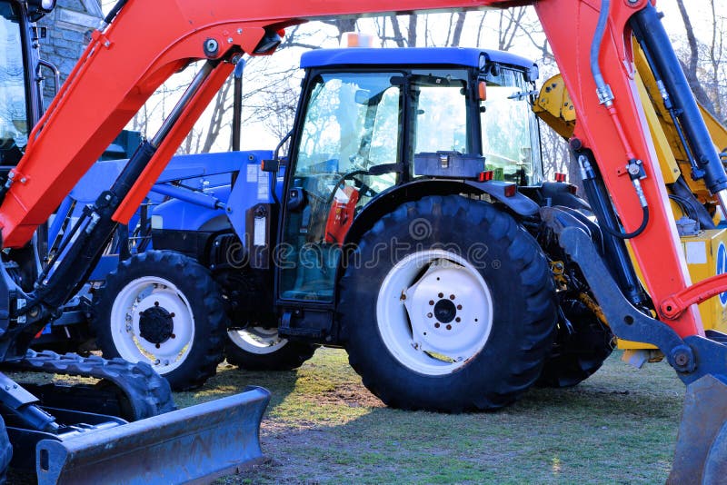 Blue Farm Tractor parked stock photo. Image of excavator - 67441972