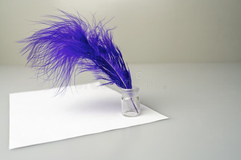 Blue Feather in Glass on White Paper Stock Photo - Image of sheet ...