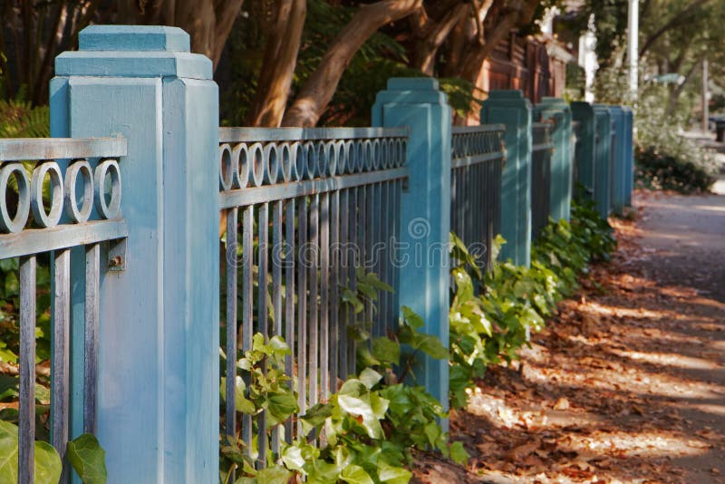 Blue Fence sidewalk stock photo. Image of protection - 16710308