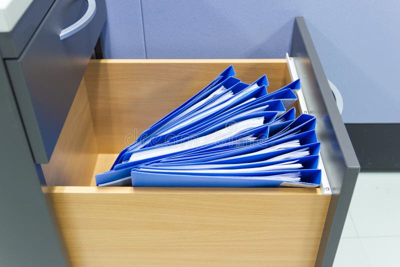 Blue File Folder With Documents On The White Table Stock Image - Image ...