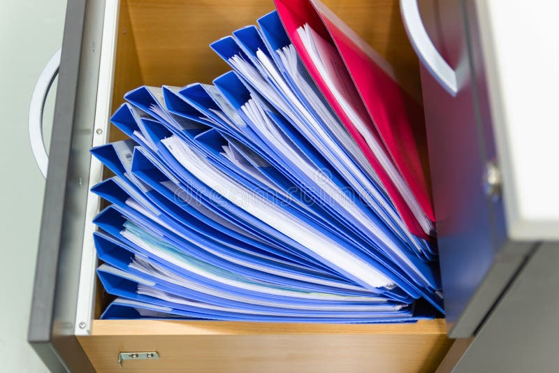Blue File Folder Documents in a File Cabinet Retention Stock Photo ...