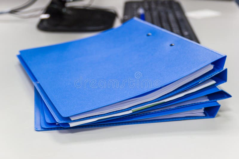 Blue File Folder Documents in a File Cabinet Retention Stock Photo ...