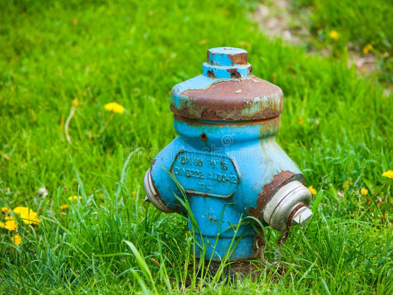 A blue fire hydrant stock photo. Image of pipe, isolated - 104838912
