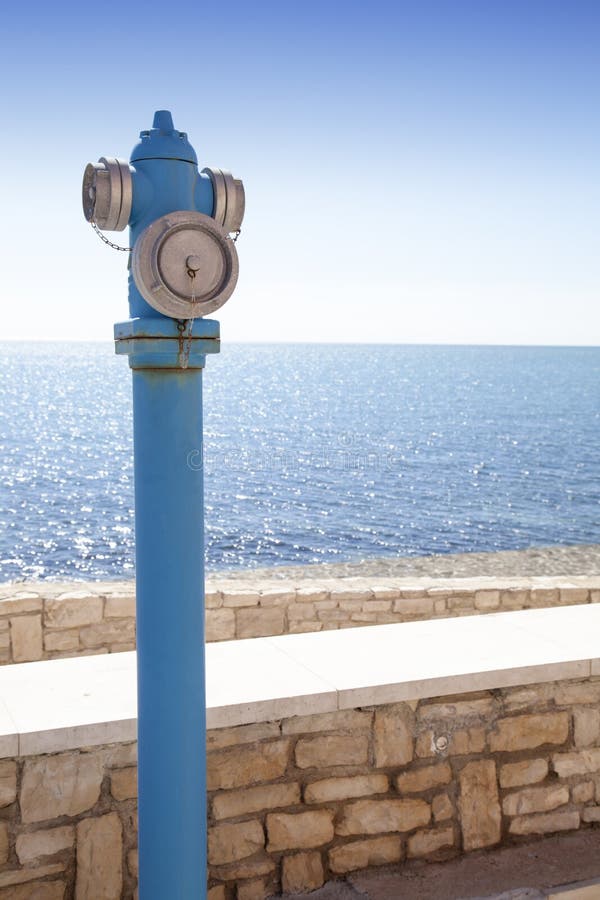 Blue Fire Hydrant on a Sea Coast Stock Image - Image of fence, safety ...