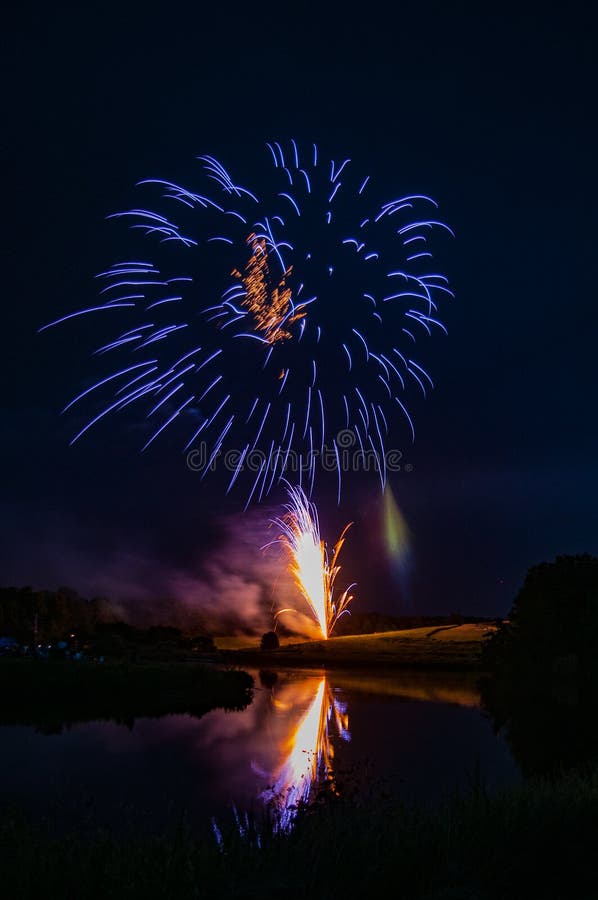 Blue Firework Explosion in the Dark Sk Stock Image - Image of evening ...