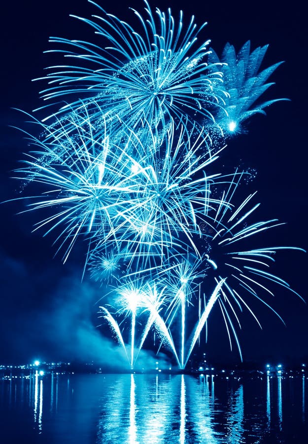 Blue Firework in a Night Sky Stock Image - Image of flashes, blue: 31616751