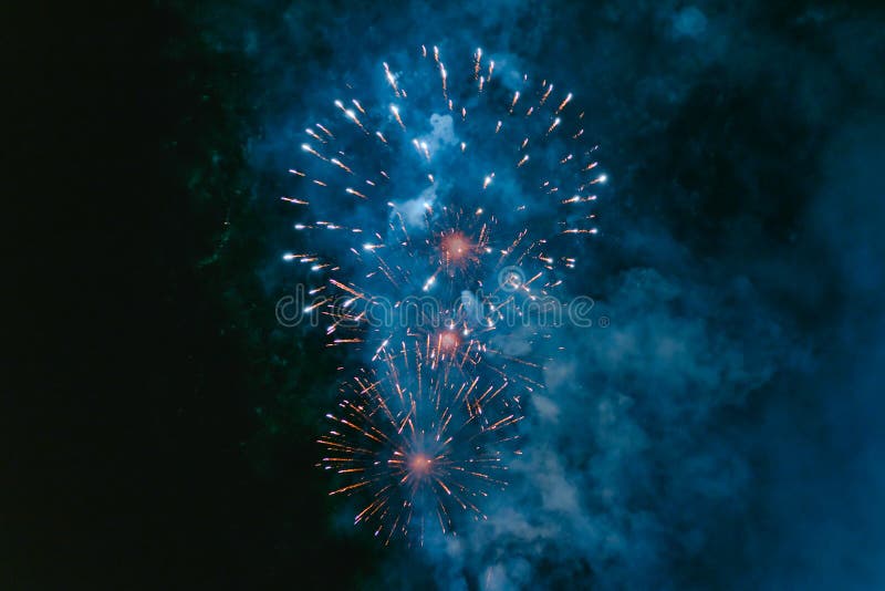 Blue Fireworks with Smoke Over the City Sky Stock Photo - Image of ...
