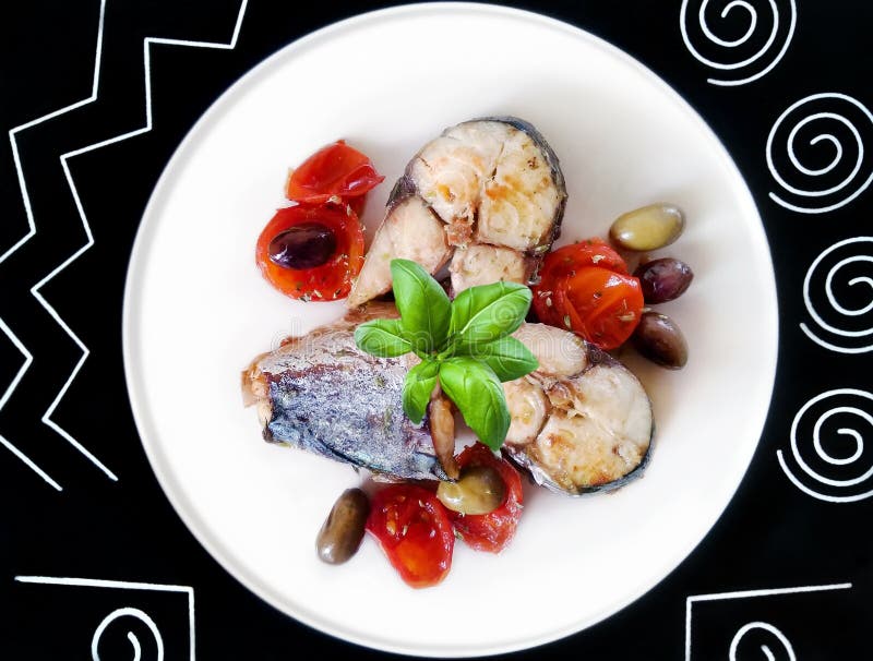 Blue fish cooked in a pan. stock image. Image of filet - 61867893