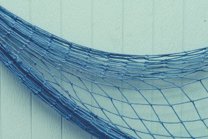 Blue Fishing Net Hanging on Wood Wall Stock Photo - Image of pattern ...