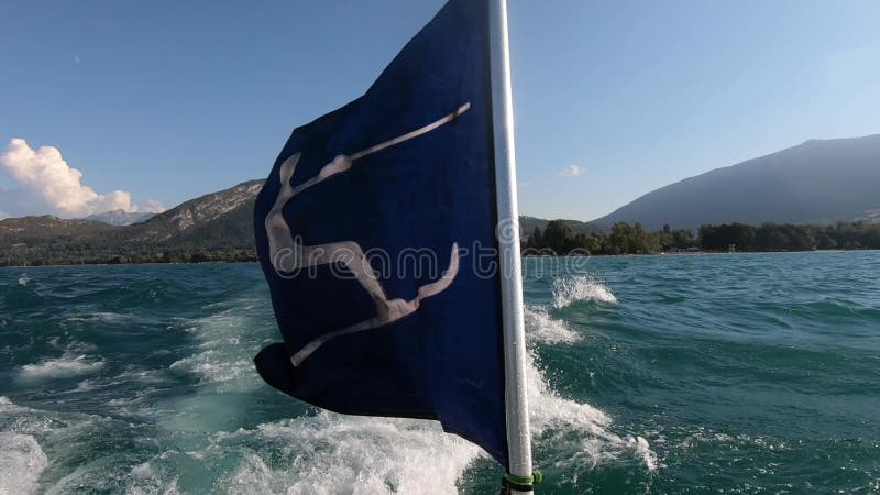 Blue flag for water skiing stock footage. Video of wave - 266002516