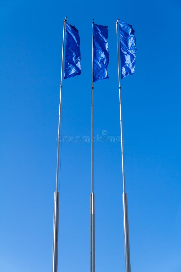 Blue flags on sky stock photo. Image of holidays, blue - 64179118
