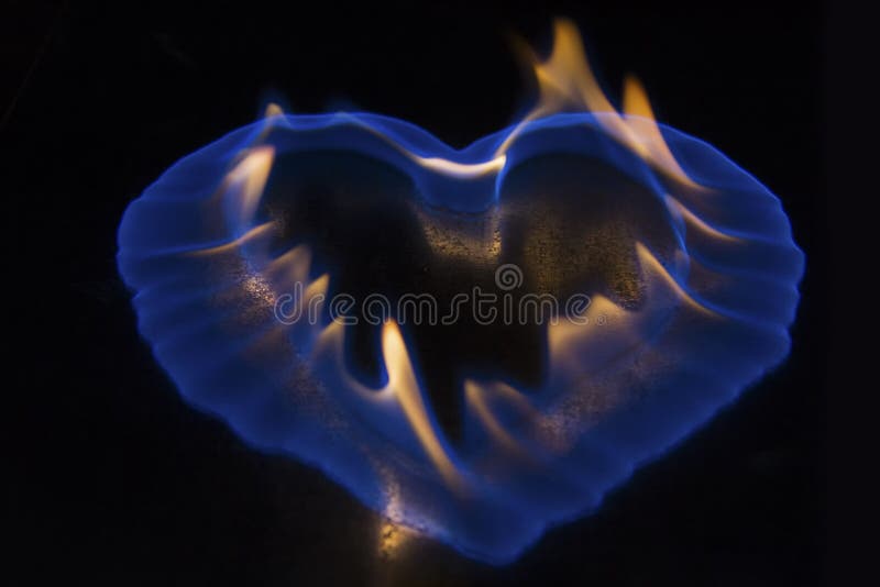Blue Flame in the Shape of Heart Burning on Shiny Surface Stock Image ...