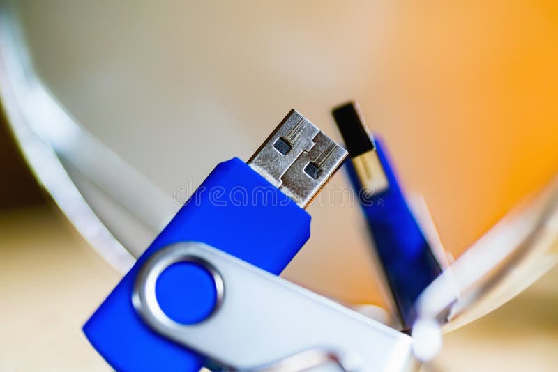 Blue Flash Memory on Hand with Isolated Blue Background Stock Photo ...