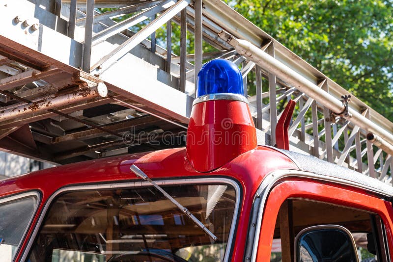 Blue Flashing Light and Part of the Arrow on a Vintage Fire Track ...
