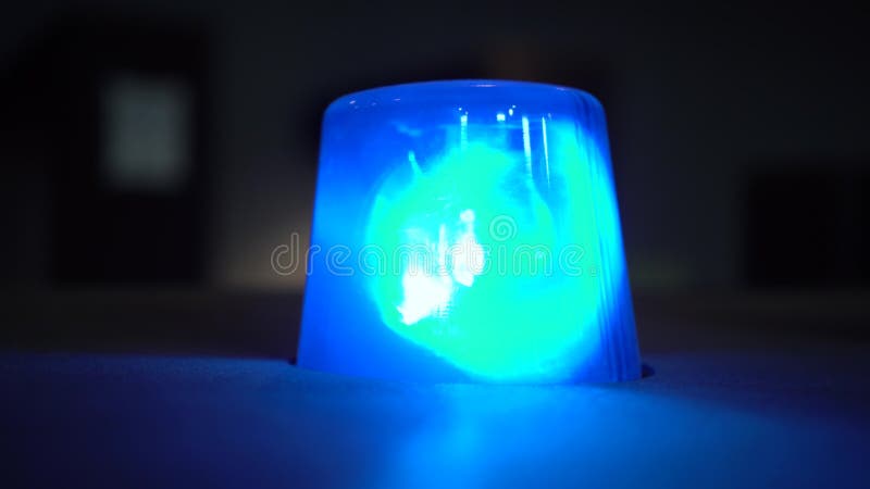 Blue Flashing Warning Light in the Dark Close Up. Stock Photo - Image ...