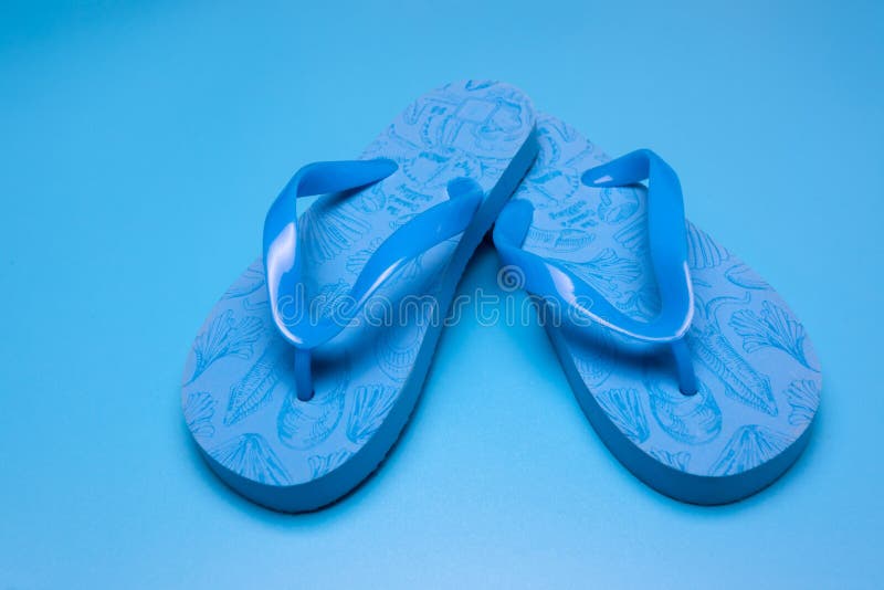 Blue Flip Flops on a Blue Background Stock Image - Image of slipper ...