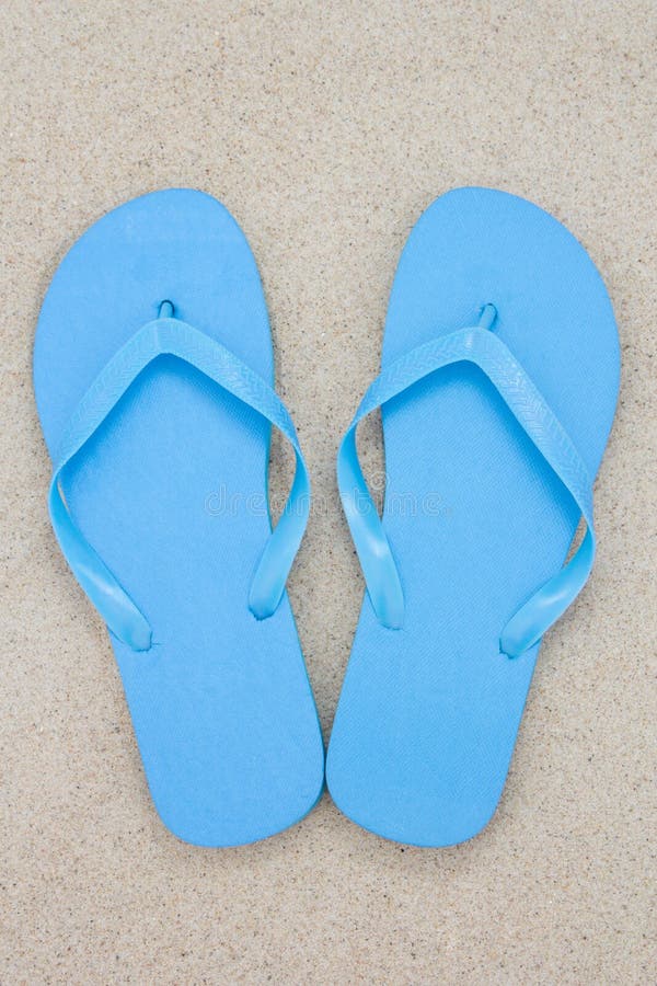 Blue flip flops on beach stock image. Image of shoes - 14269671
