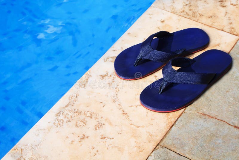 Blue Flip Flops at the Edge of a Swimming Pool Stock Image - Image of ...