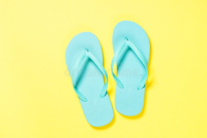 Blue Flip Flops on Yellow Background. Stock Photo - Image of vacation ...