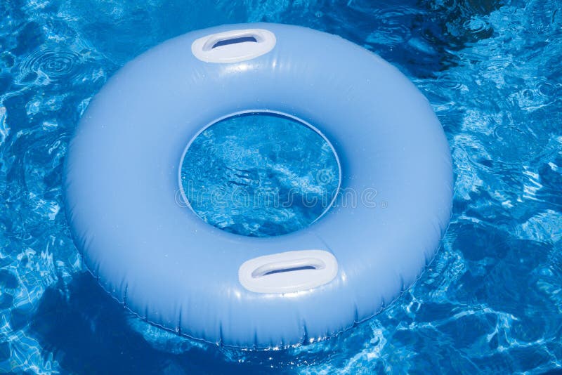 Blue Floater with Handles in Water of Pool Stock Photo - Image of ...