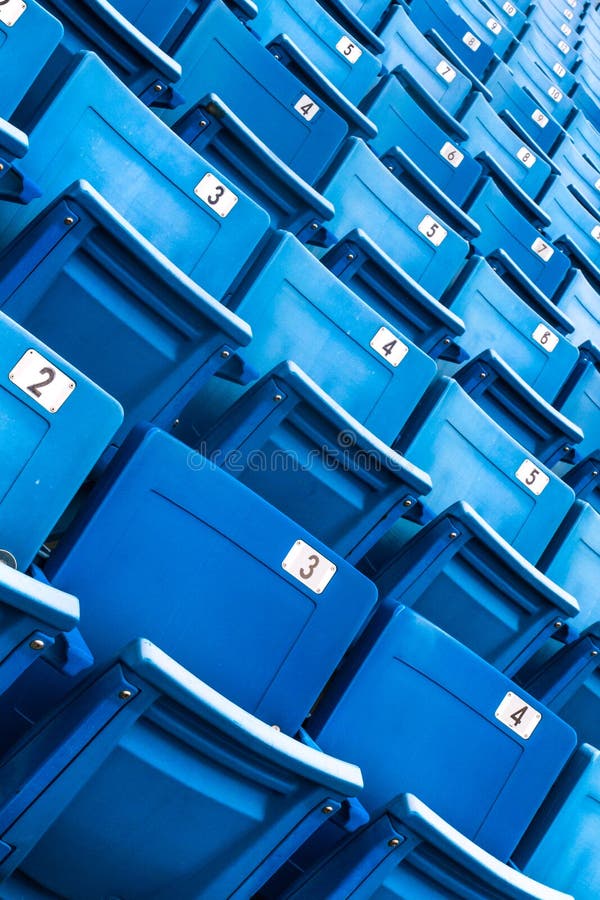 Blue seats on stadium stock photo. Image of awning, field - 8708124