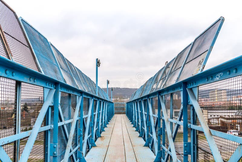 Blue Footbridge Over Railroad Stock Photo - Image of mesh, blue: 49209436
