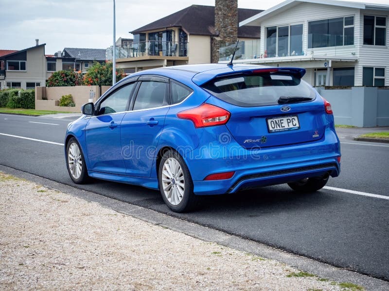 Blue Ford Focus on Road Side Editorial Photo - Image of suburb, style ...