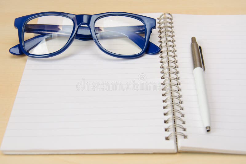 Blue Frame Eye Glasses Empty Notebook Stock Photos - Free & Royalty ...