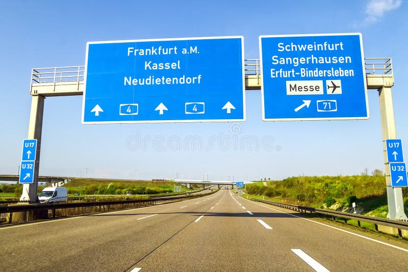 Blue Freeway Sign Over the Road in Germany on Sunny Day Stock Photo ...