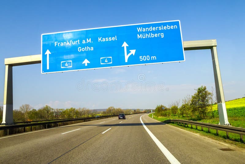 Blue Freeway Sign Over the Road in Germany on Sunny Day Stock Image ...
