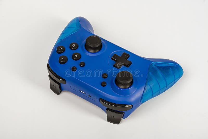 Blue Game Controller for Playstation on a White Background. Stock Photo ...