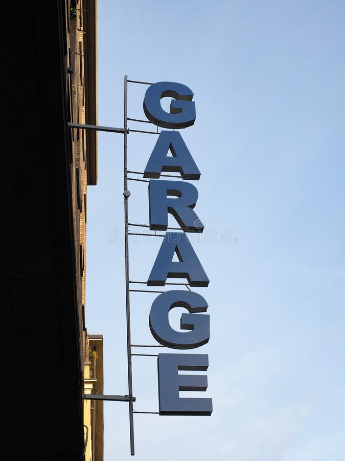 Blue garage sign stock photo. Image of light, neon, sign - 243545910