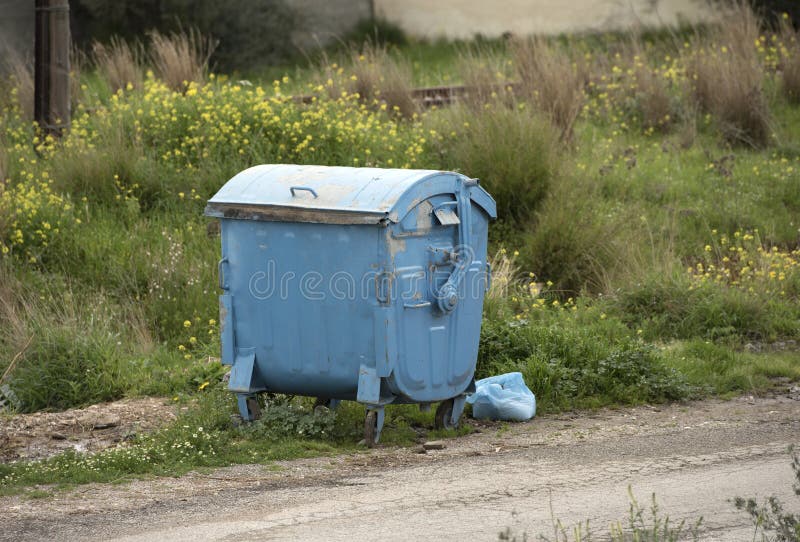 Blue Garbage Bin and Uncollected Waste. Stock Image - Image of outdoor ...