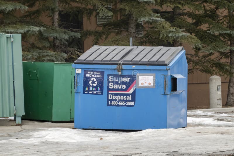 A Blue Garbage Dumpster of Recycle Waste during the Winter Editorial ...