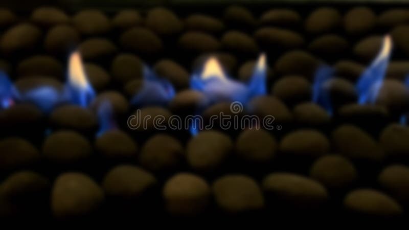 Blue Gas Fire Roaring through Small Stones Stock Photo - Image of ...