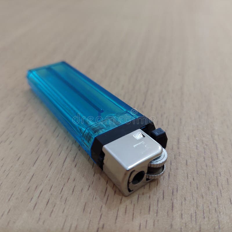 Blue Gas Lighter that is Refillable and Easy To Carry Stock Image ...