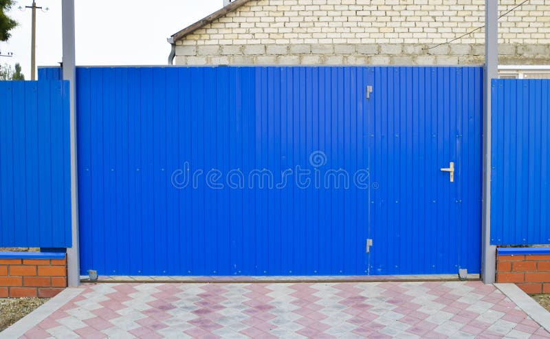 Fence and Gate from Sheets of Blue Metal Stock Image - Image of ...