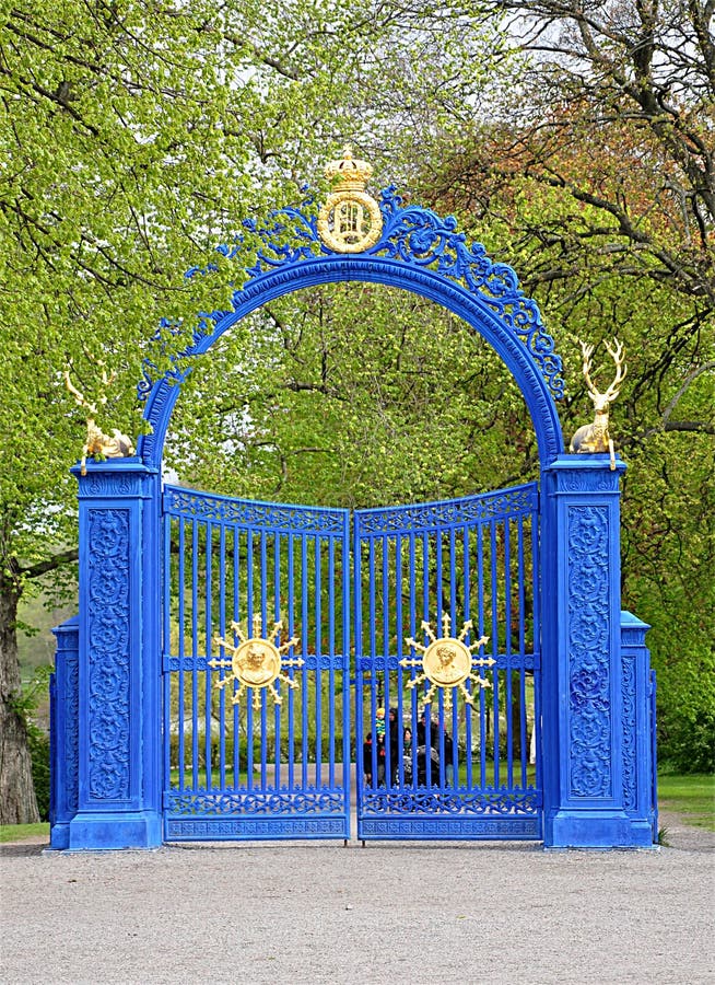 Blue gate in the park editorial stock photo. Image of product - 90495738