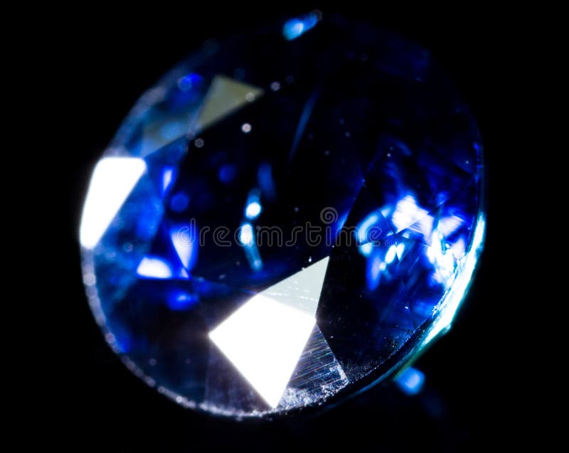 A Blue Gem on a Black Background Stock Photo - Image of black, diamond ...