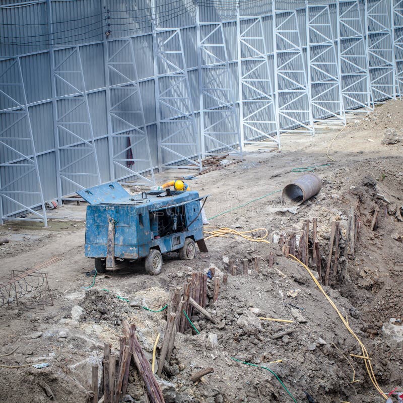 Man Pushing Portable Generator Stock Photo - Image of isolated ...