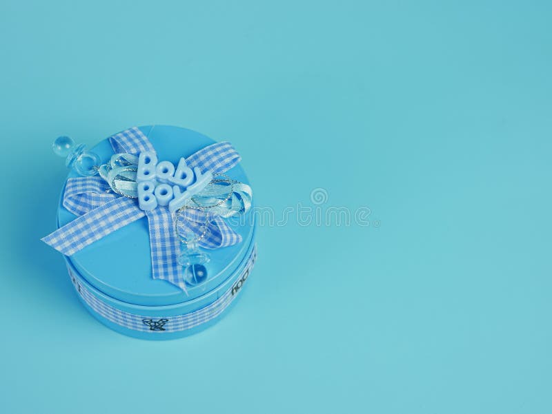 Blue Gift Tin for Baby Boy Isolated on Blue Background Stock Image ...