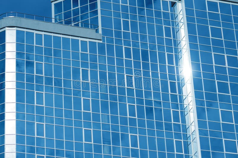 Blue glass office building stock image. Image of corporate - 83768065