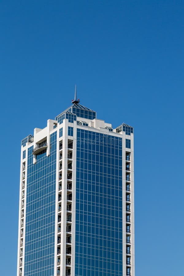 Blue Glass Office Tower with White Stone Corners Stock Photo - Image of ...