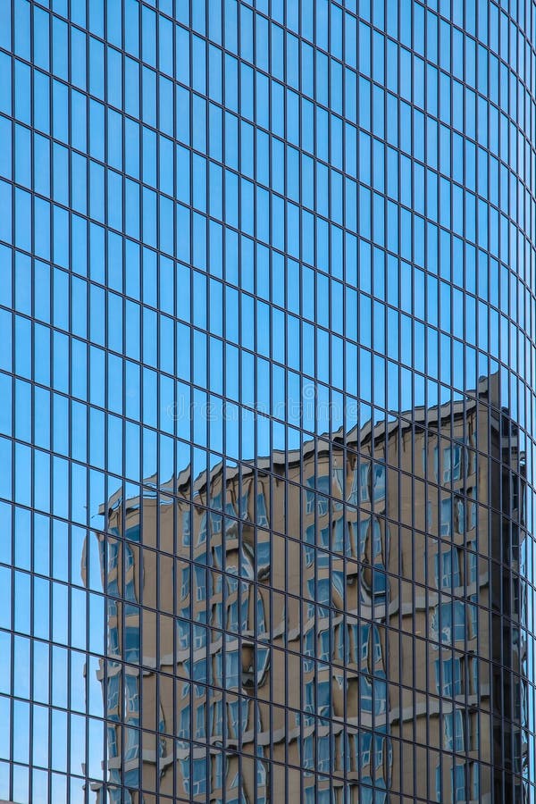 Blue Glass Skyscraper with the Reflection of Another Building Stock ...